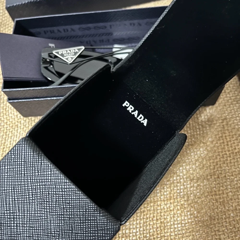 Prada | Accessories | Prada Black Oval Logo Sunglasses | Poshmark